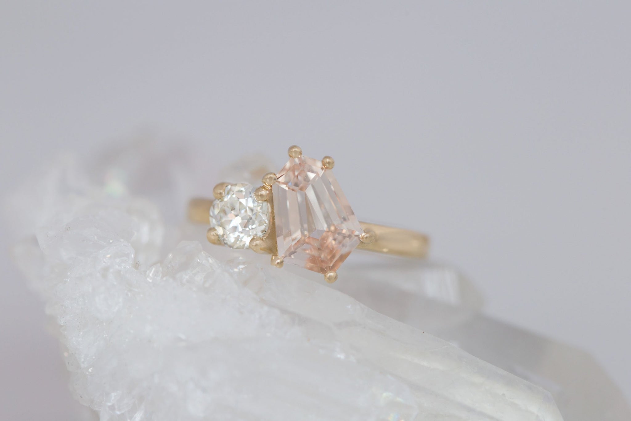 Liana Ring | Peach Geometric Step Cut Sapphire + Round Diamond Engagem